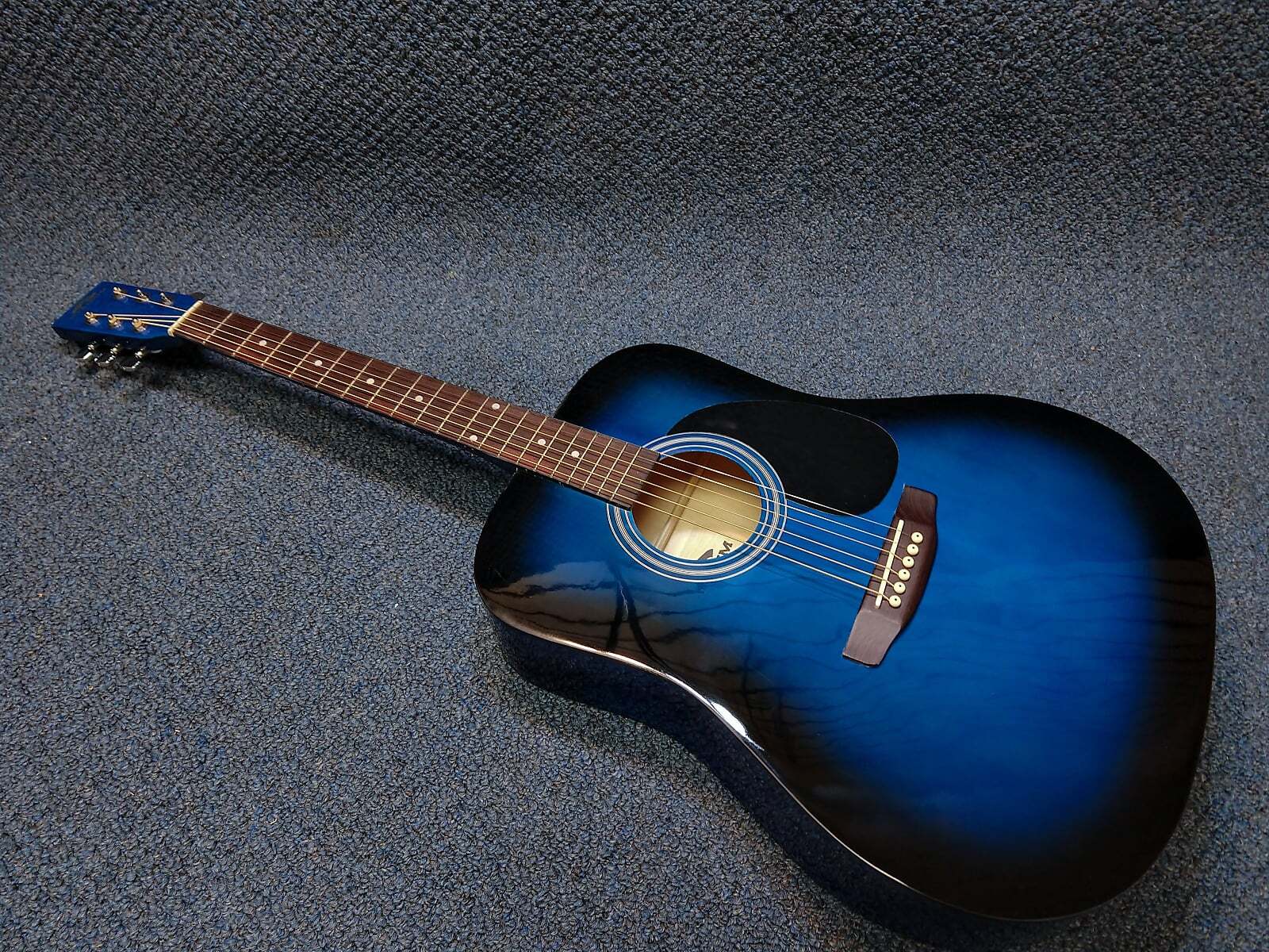 Black And Blue Acoustic Guitars